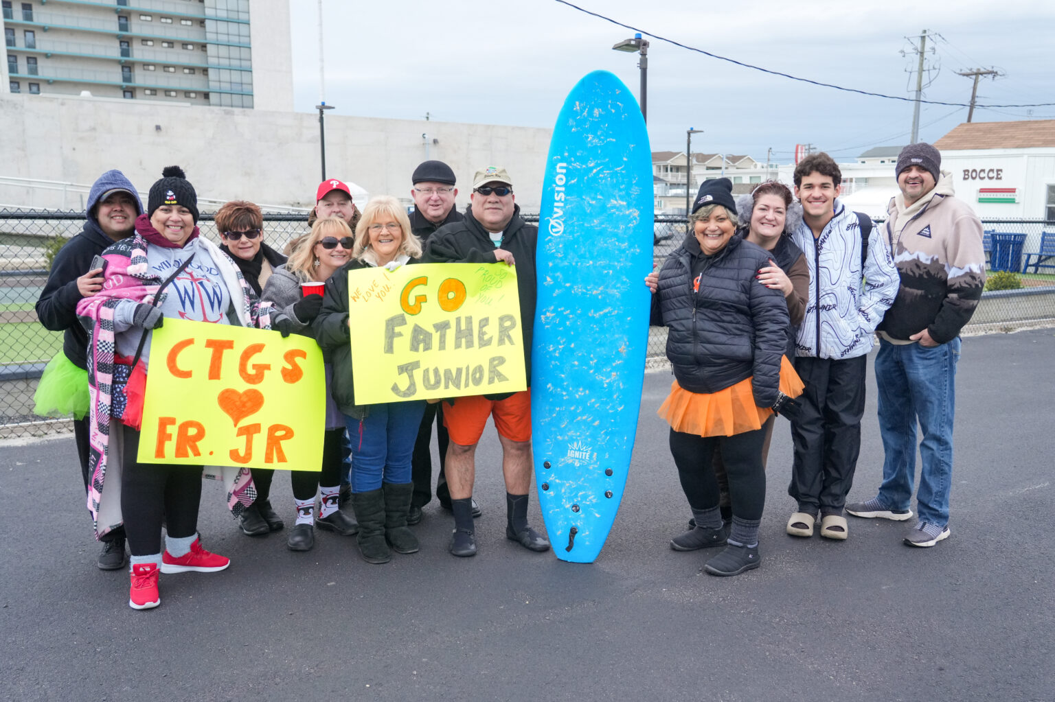 Priest steps outside comfort zone, into cold ocean for charity ...